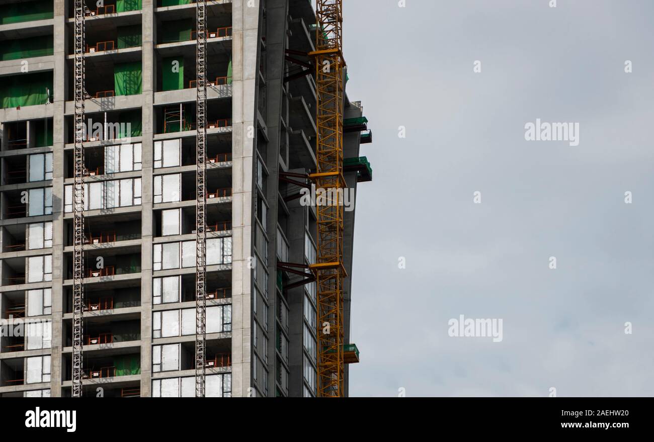 Construction site of building a high-rise building with a cranes ...