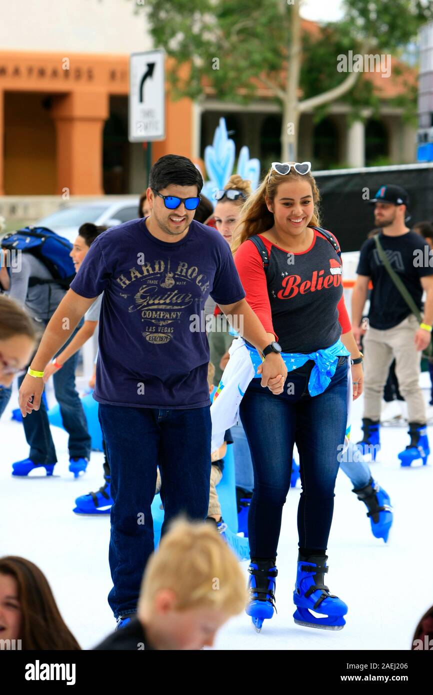People enjoying the outdoor ice skating rink in downtown Tucson AZ ...