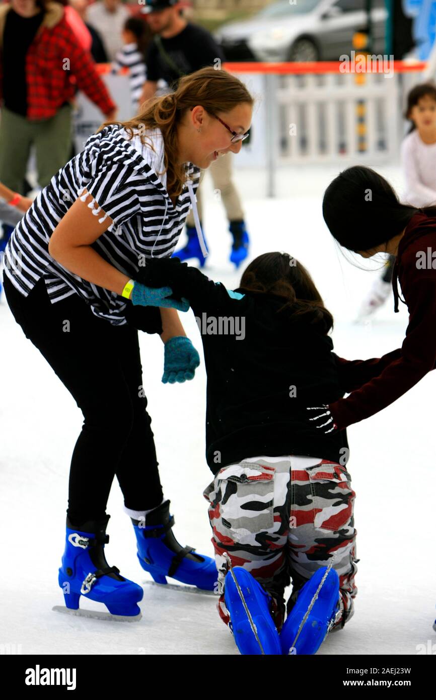 People enjoying the outdoor ice skating rink in downtown Tucson AZ ...