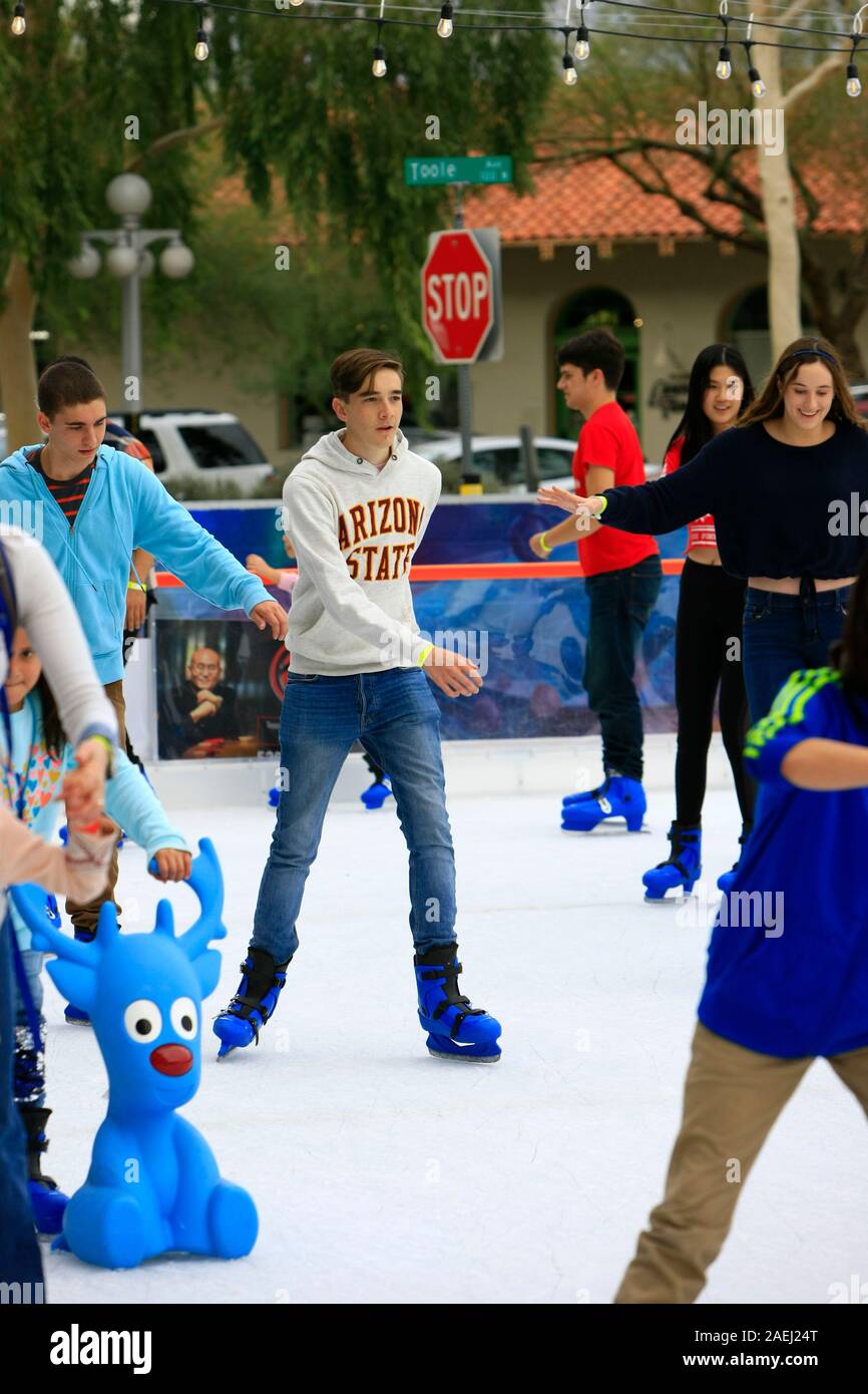 People enjoying the outdoor ice skating rink in downtown Tucson AZ ...