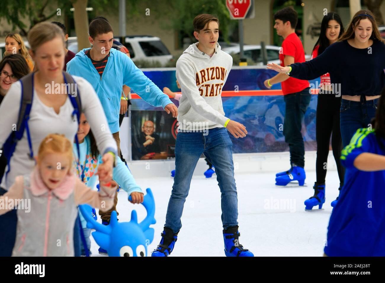 People enjoying the outdoor ice skating rink in downtown Tucson AZ ...