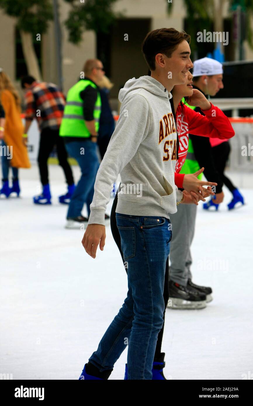 People enjoying the outdoor ice skating rink in downtown Tucson AZ ...