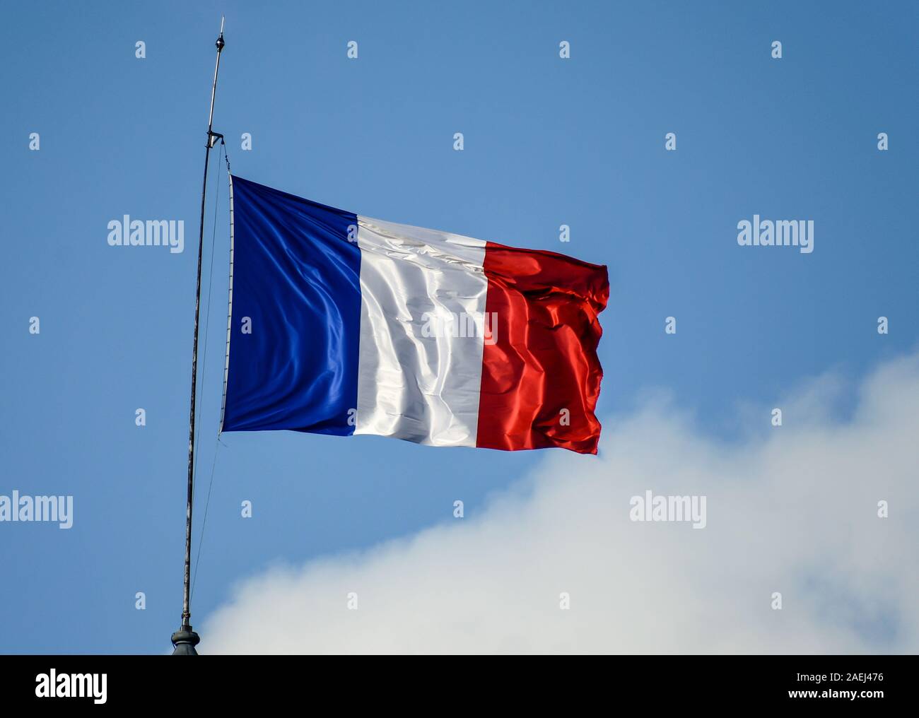 Flag of France waiving against sky on windy day Stock Photo - Alamy