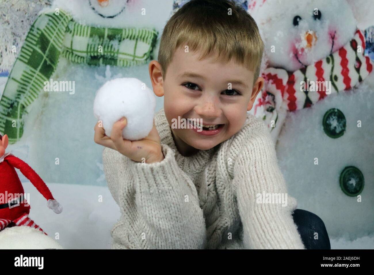 Two brother on the floor of a snow scene Stock Photo - Alamy