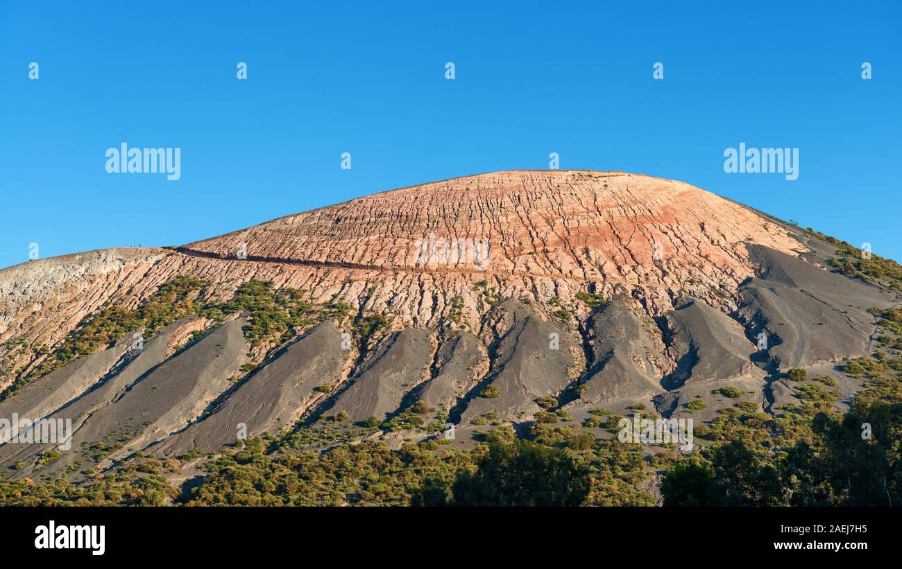 volcanic structure of the vulcano mountain on blue sky background ...