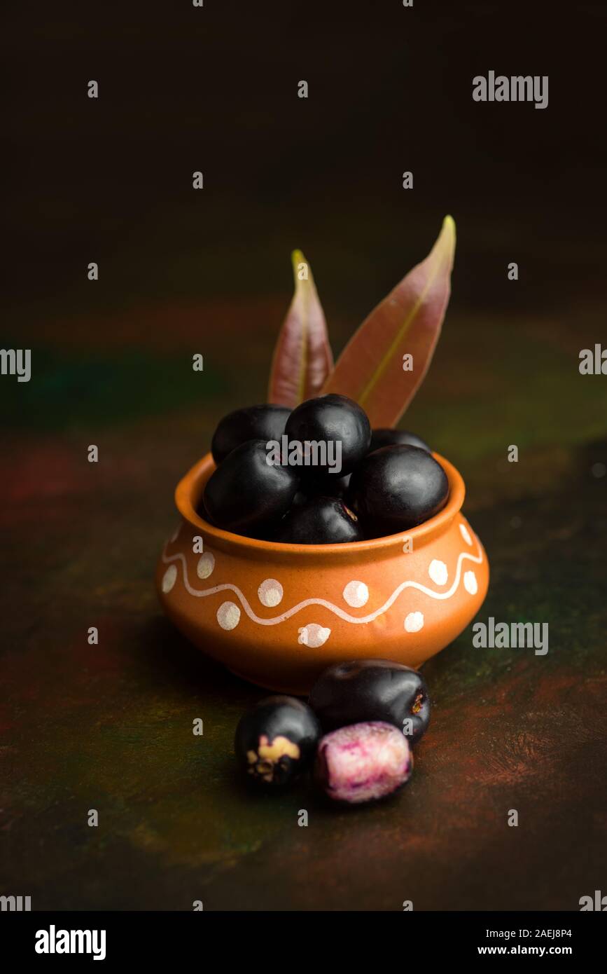 Jambolan plum or jambul or Jamun fruit, Java plum (Syzygium cumini) on ...