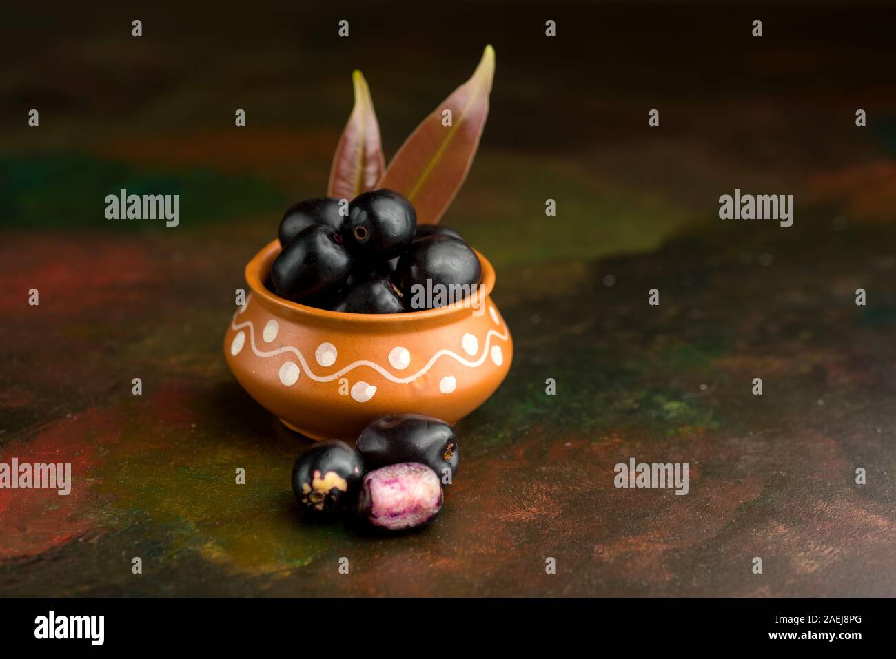 Jambolan plum or jambul or Jamun fruit, Java plum (Syzygium cumini) on ...