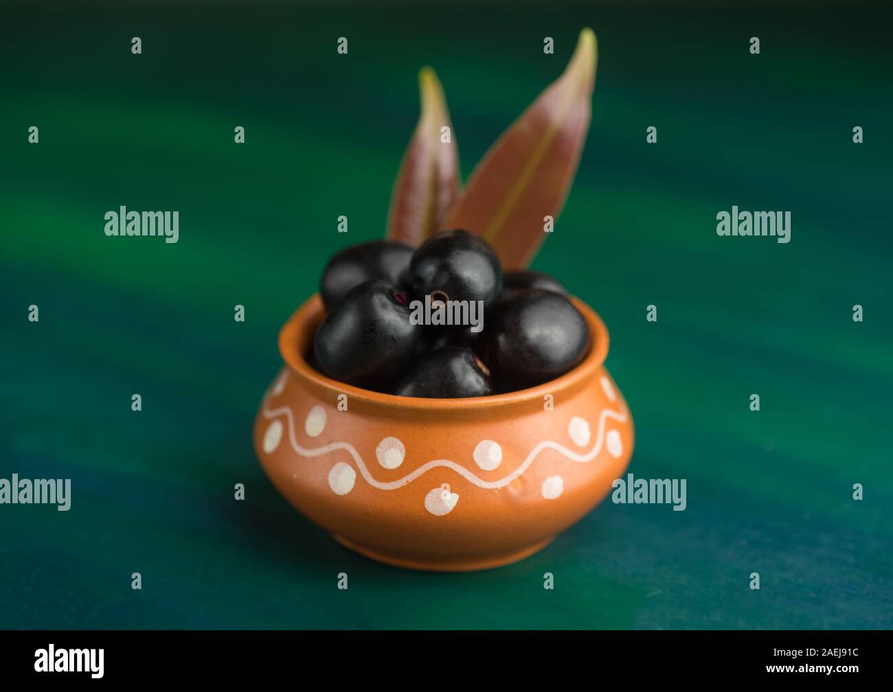 Jambolan plum or jambul or Jamun fruit, Java plum (Syzygium cumini) on ...