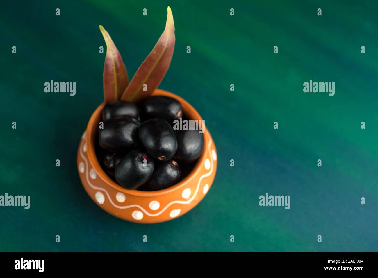 Jambolan plum or jambul or Jamun fruit, Java plum (Syzygium cumini) on ...