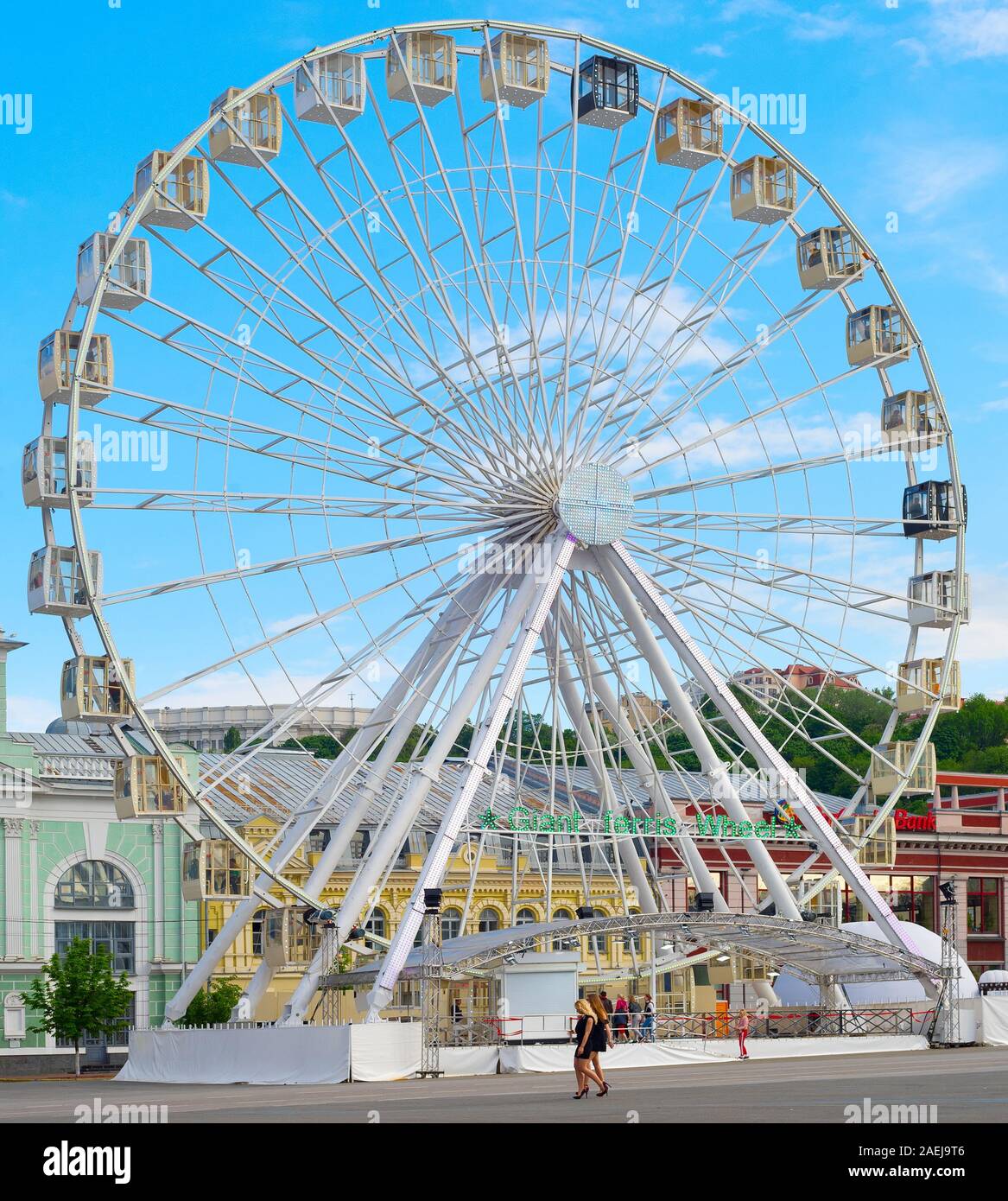 KIEV, UKRAINE - MAY 11, 2019: People walking by giant Ferries Wheel in ...