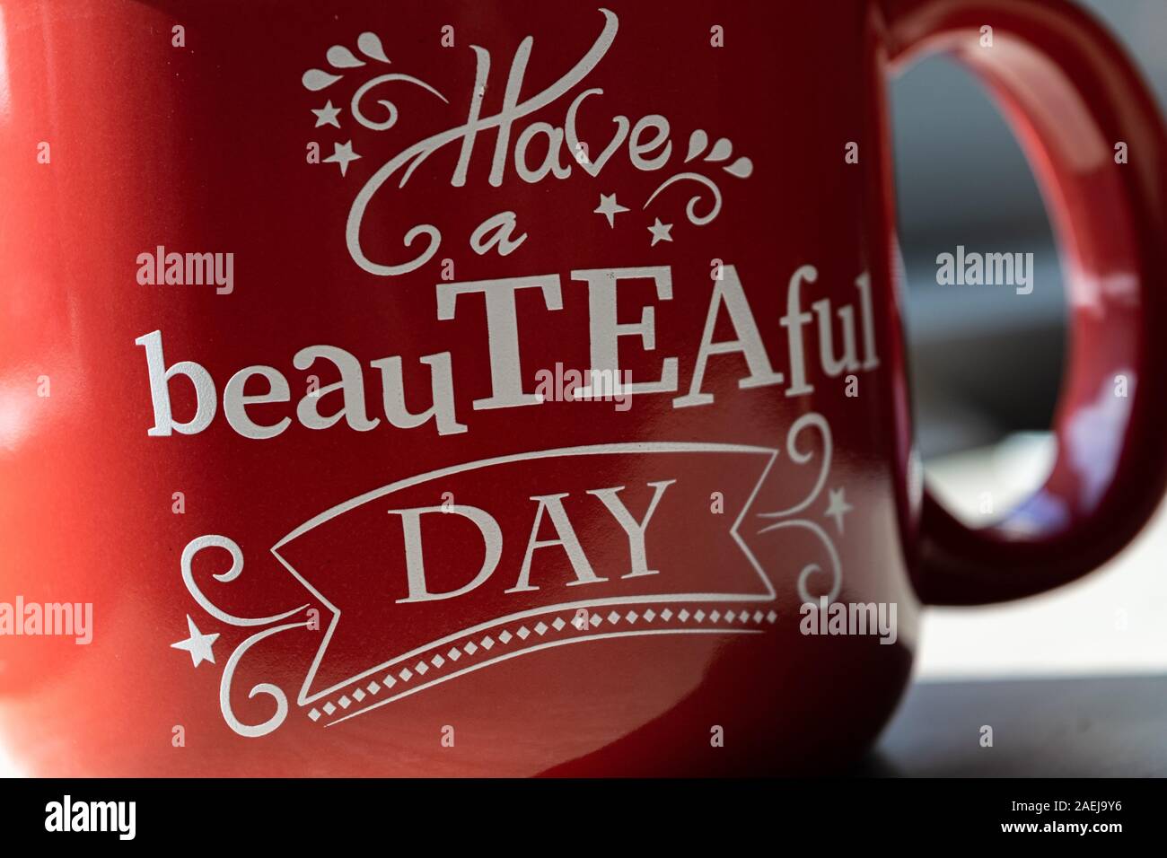 Red tea cup with a text Stock Photo - Alamy