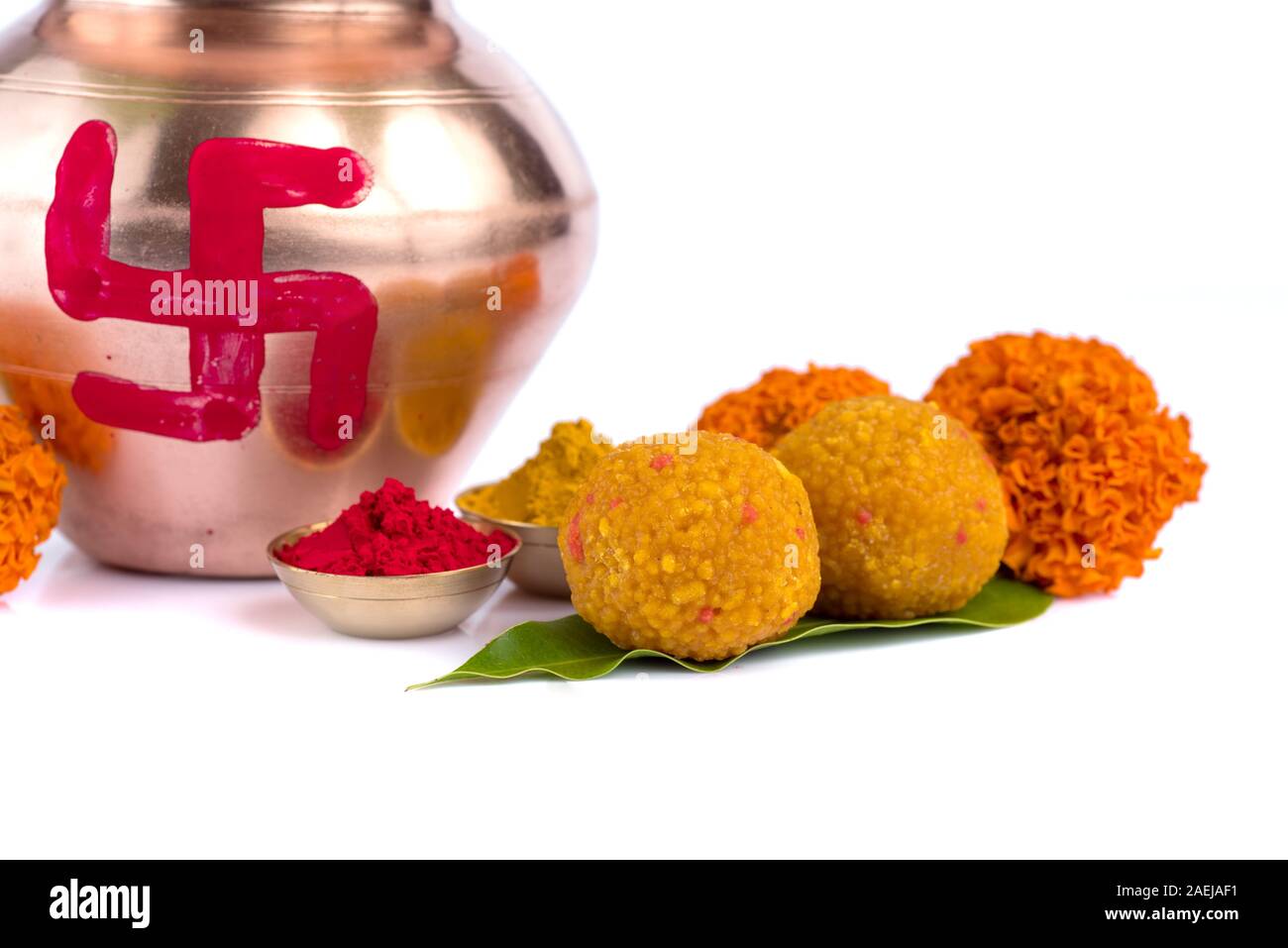 Copper Kalash with coconut, mango leaf, Haldi, kumkum and sweets with ...