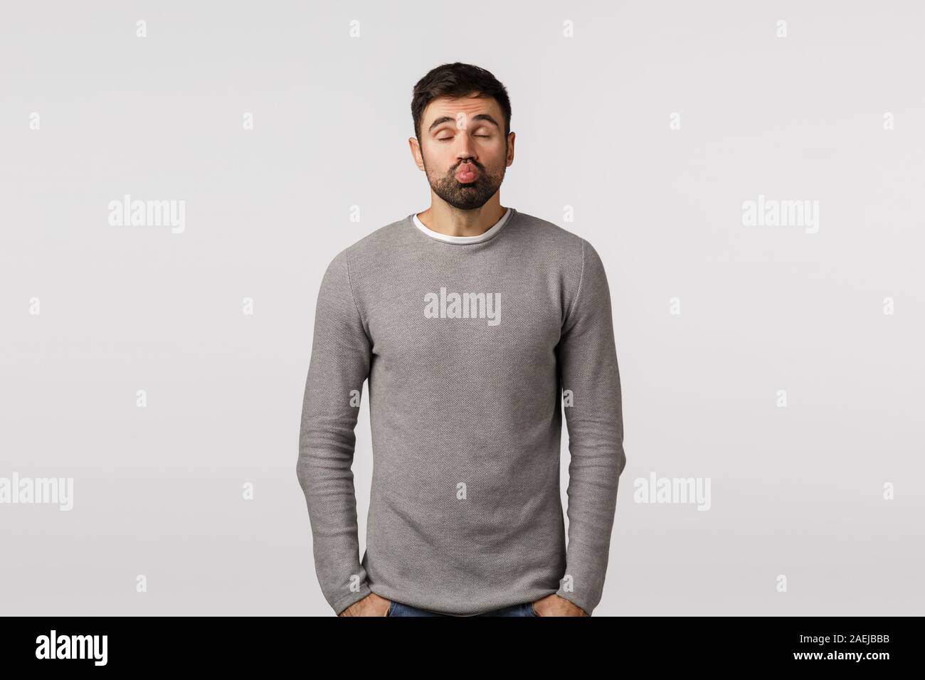 Funny bearded boyfriend asking for kiss with hilarious expression ...