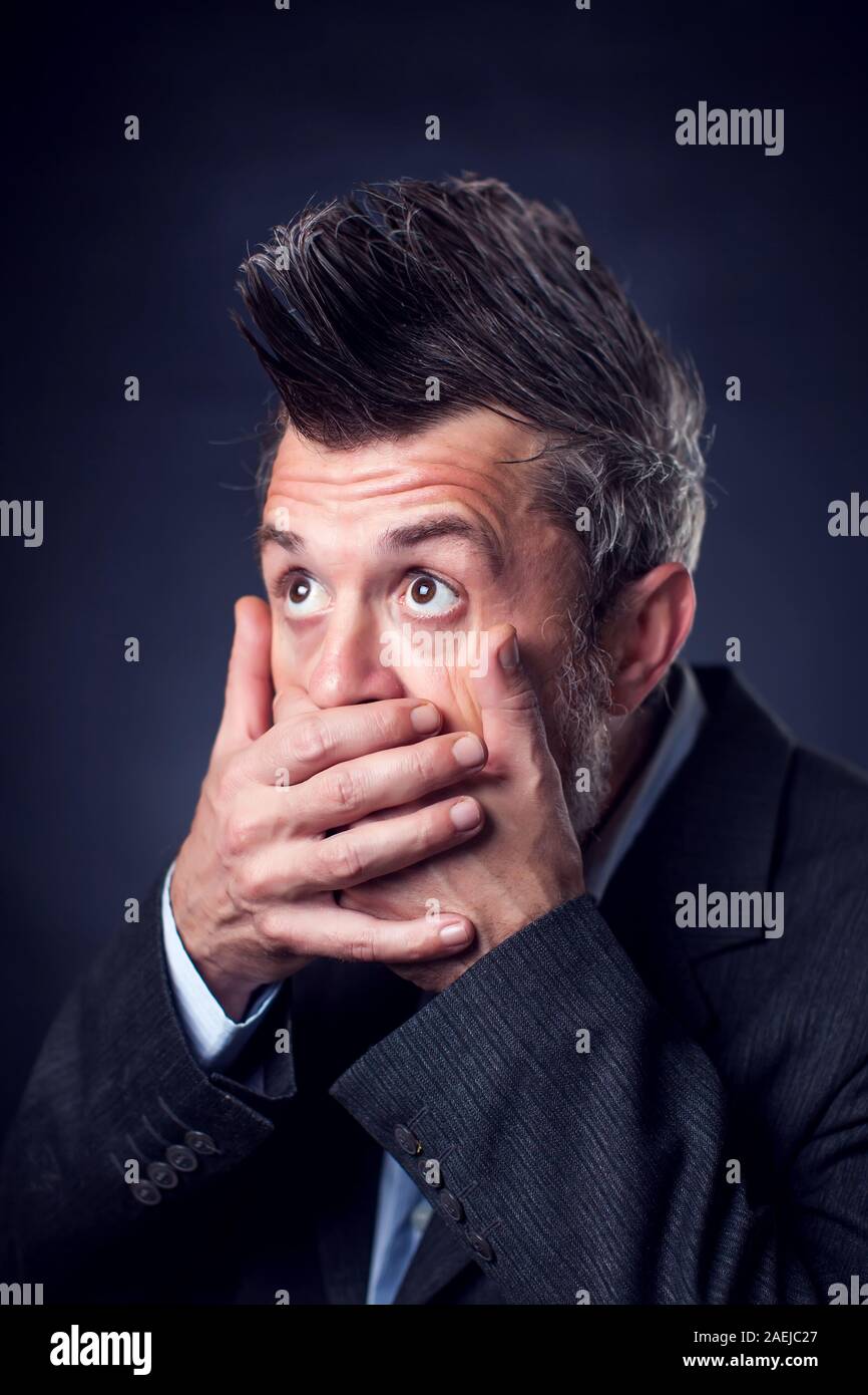 Shocked man suit hi-res stock photography and images - Alamy