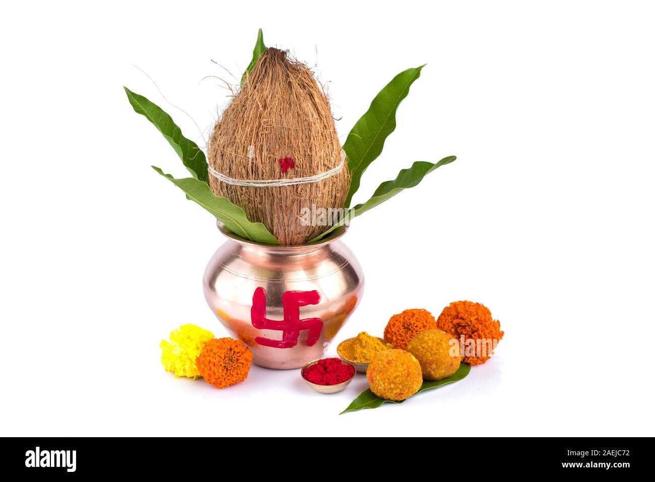 Copper Kalash with coconut, mango leaf, Haldi, kumkum and sweets with ...