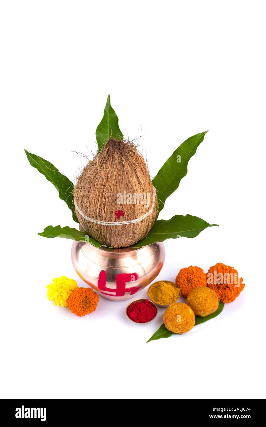 Copper Kalash with coconut, mango leaf, Haldi, kumkum and sweets with ...