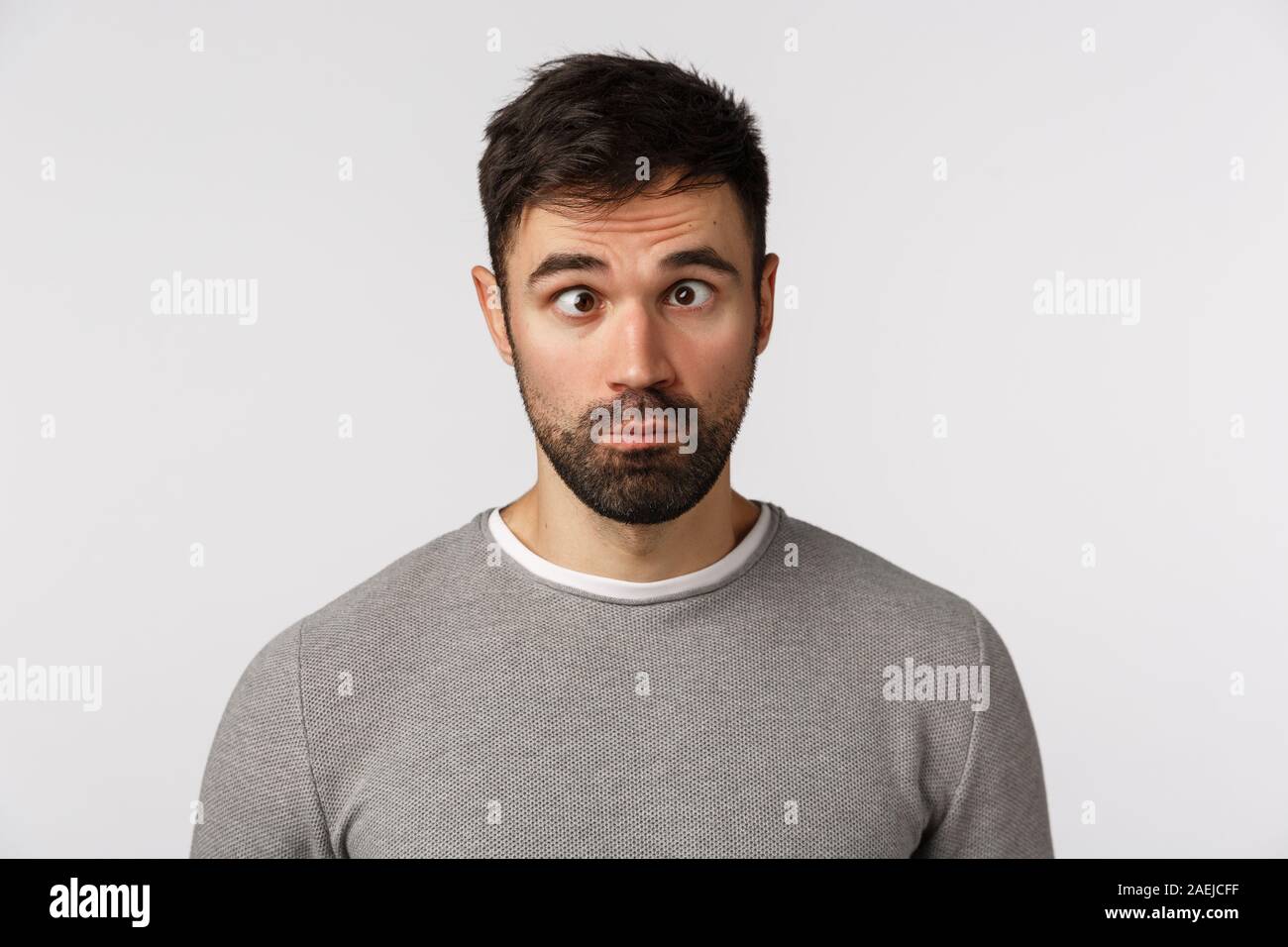 Emotions, people concept. Funny and goofy cute bearded guy making crazy ...