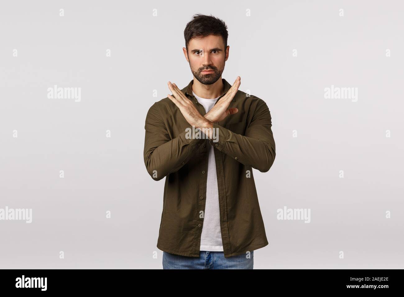 Man cross gesture no white angry hi-res stock photography and images ...