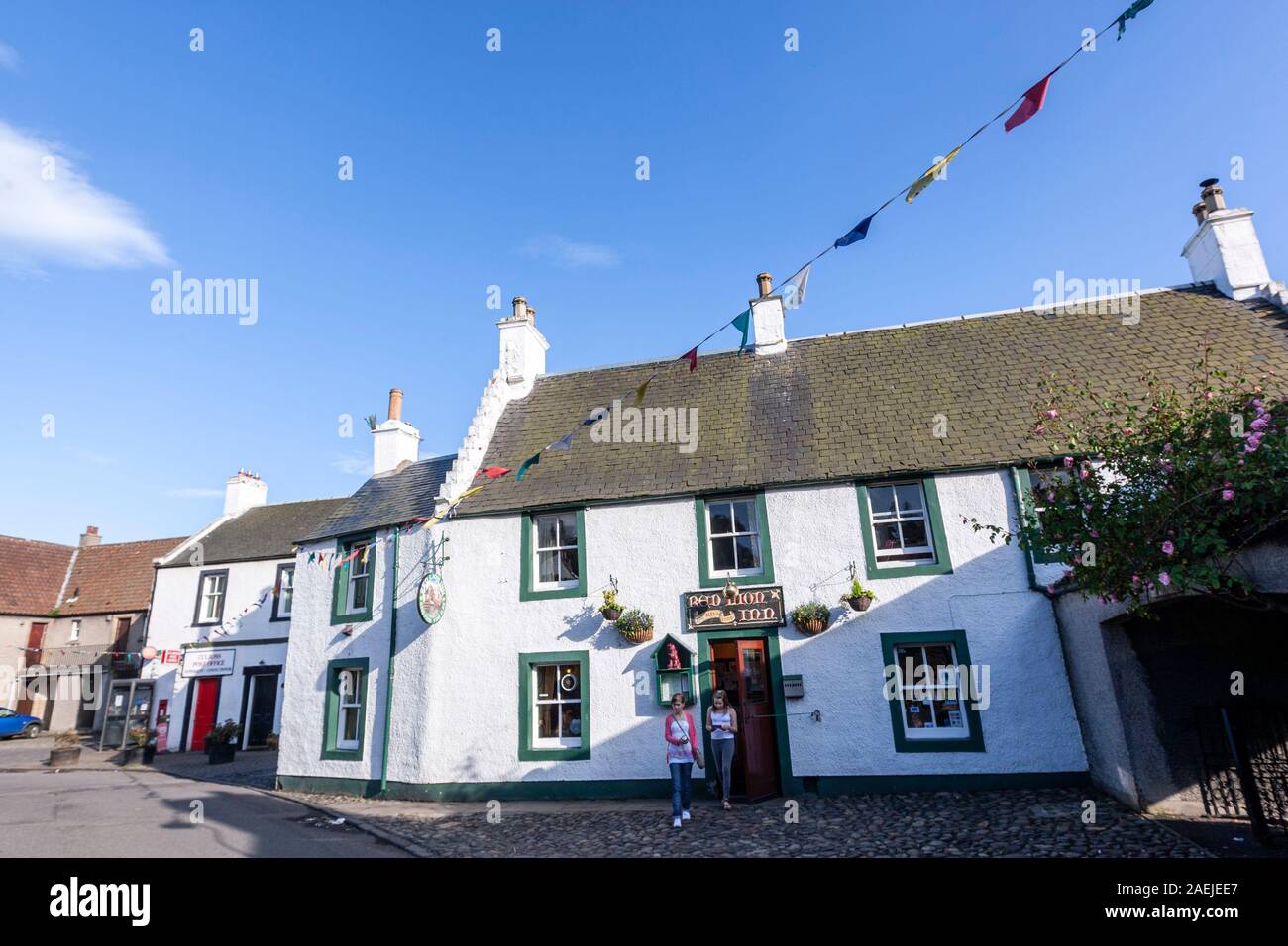 Couple of young girls leaving The Red Lion Inn, pub in Low Causeway ...