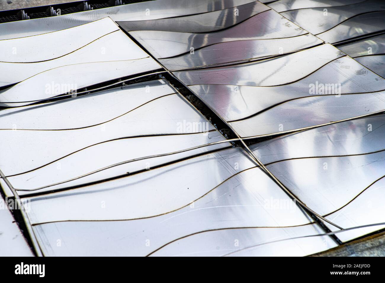 Galvanized stainless steel sheets. Production of metal pipes Stock ...