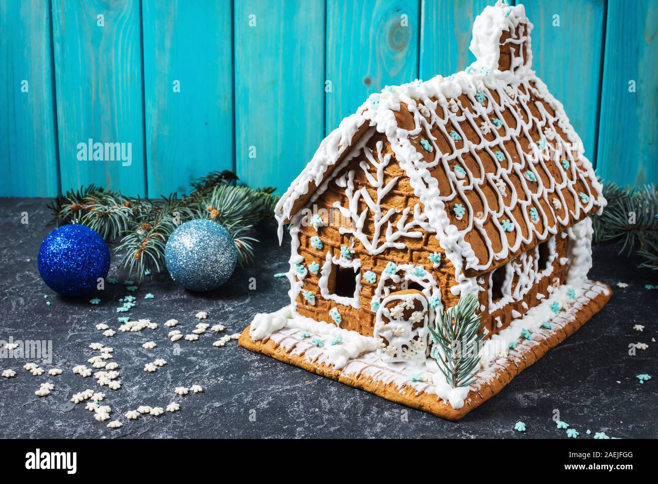 Homemade gingerbread house on black stone background Stock Photo - Alamy