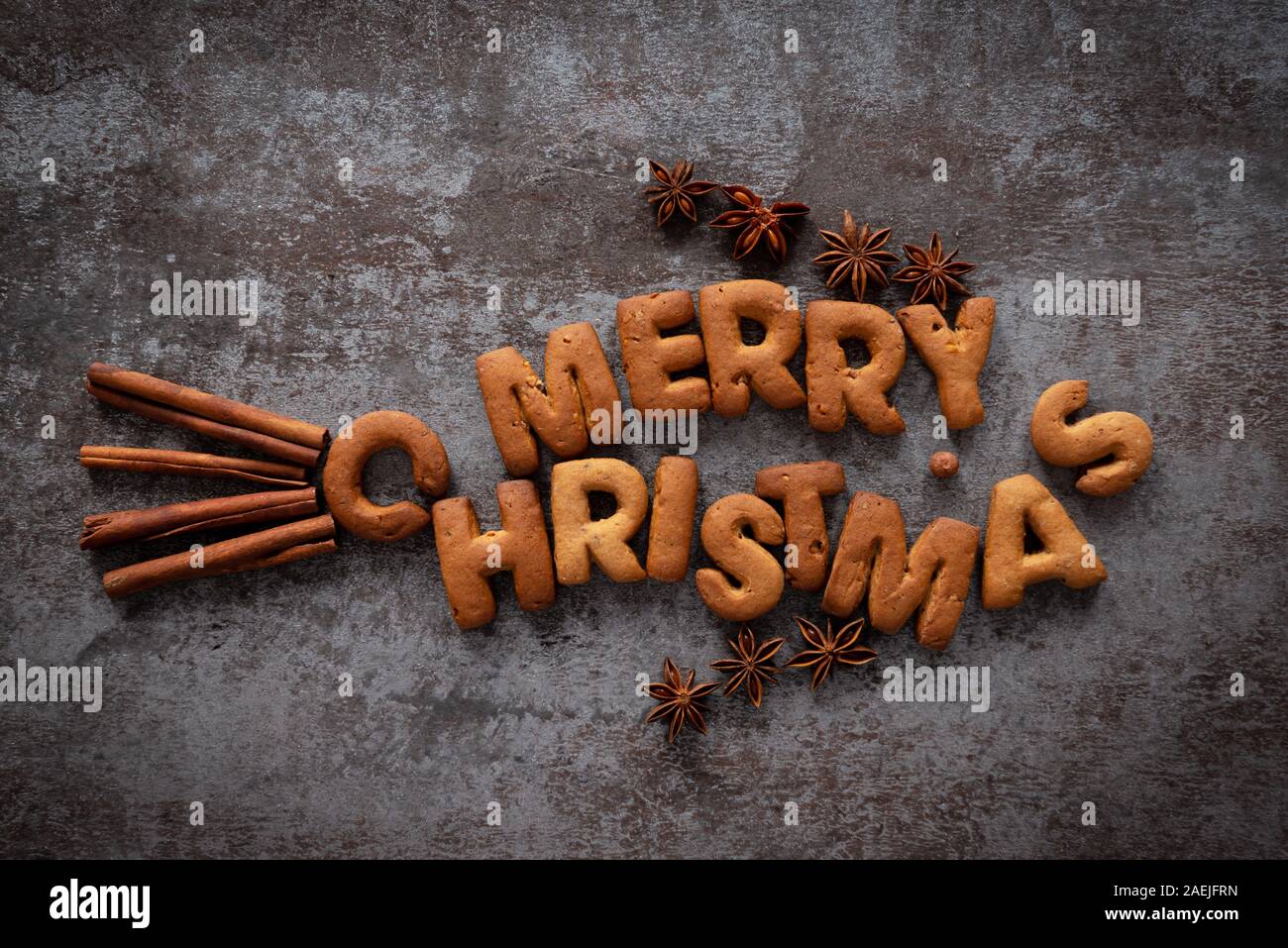 Gingerbread words Merry Christmas stacked in the shape of a fish as a ...