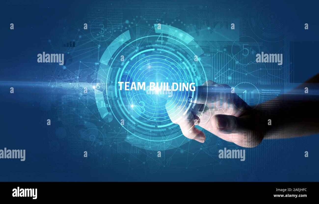 Hand touching TEAM BUILDING button, modern business technology concept ...