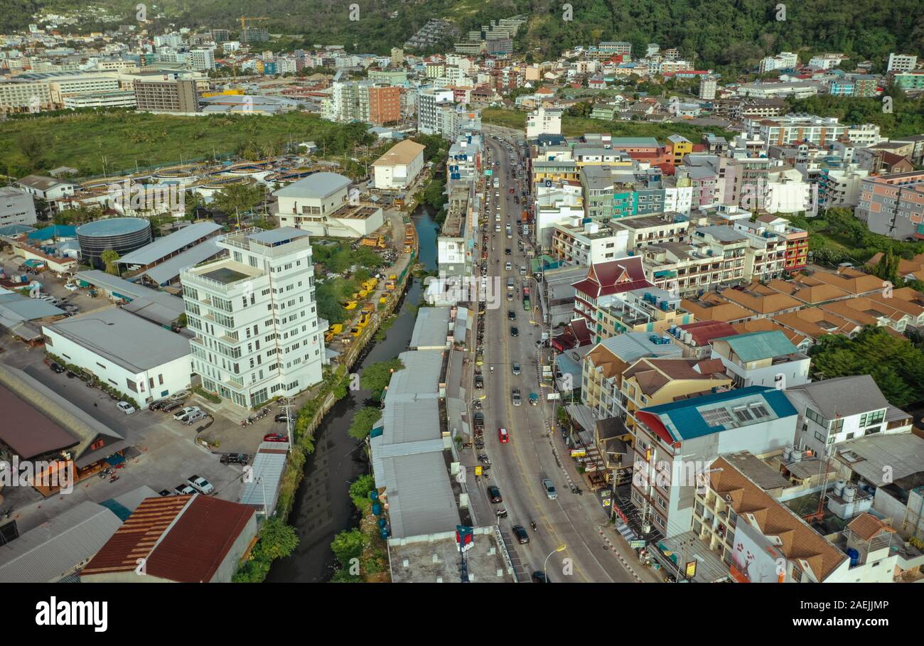 Cars and Bikes traffic in Patong city, Thailand Phuket Island 4K Drone flight Stock Photo - Alamy