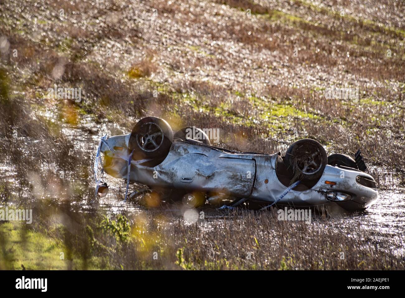 Car wreck in a field after as seriour accident Stock Photo - Alamy