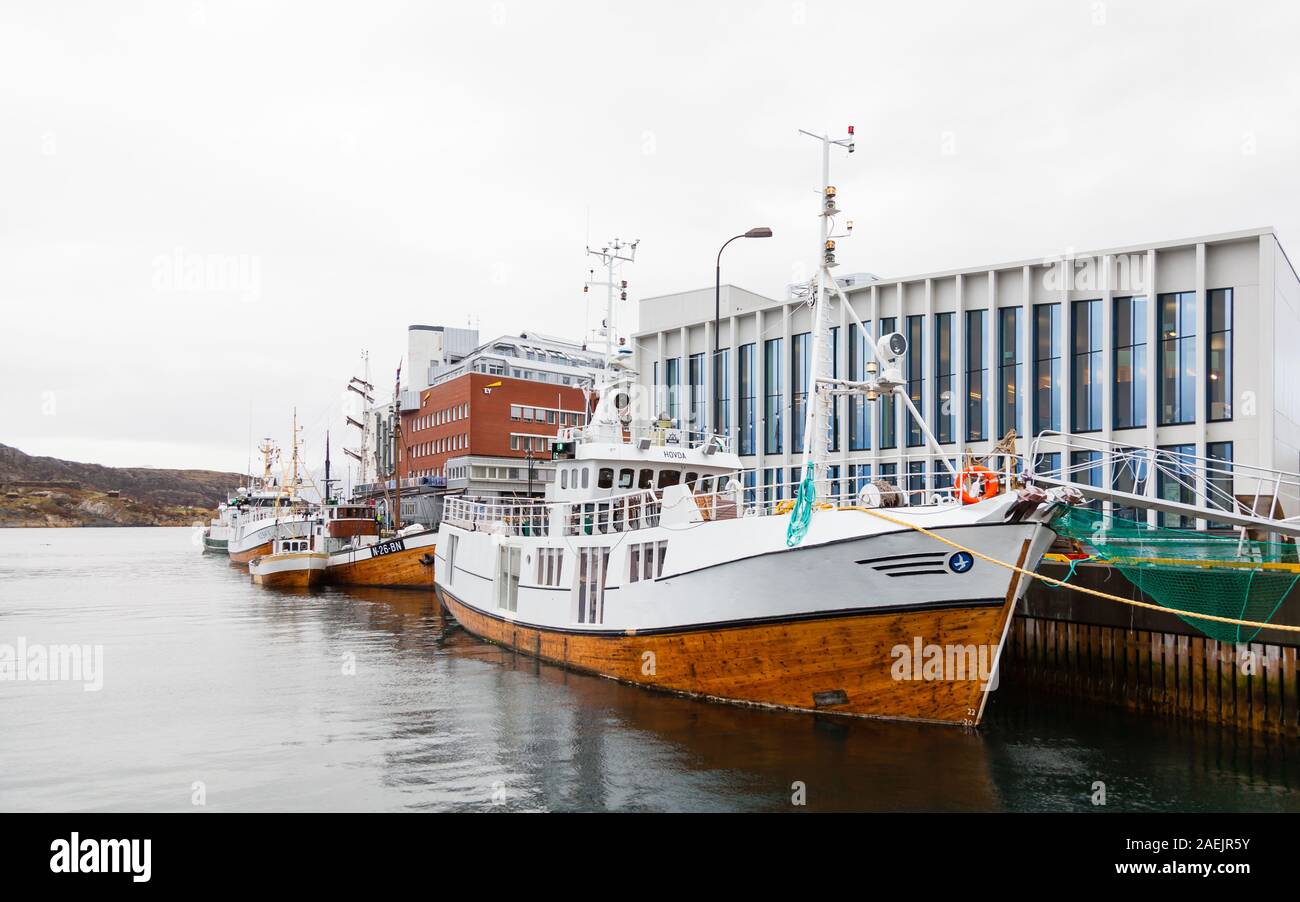 Boats are pictured moored on the Bodo quayside in Norway Stock Photo ...