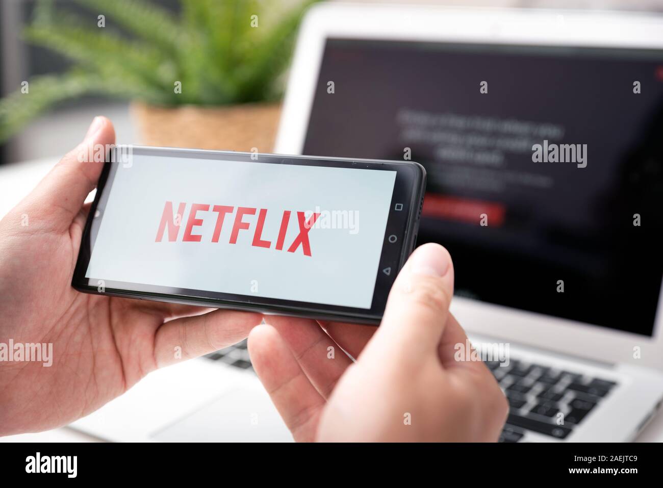 Watching netflix at home hi-res stock photography and images - Alamy