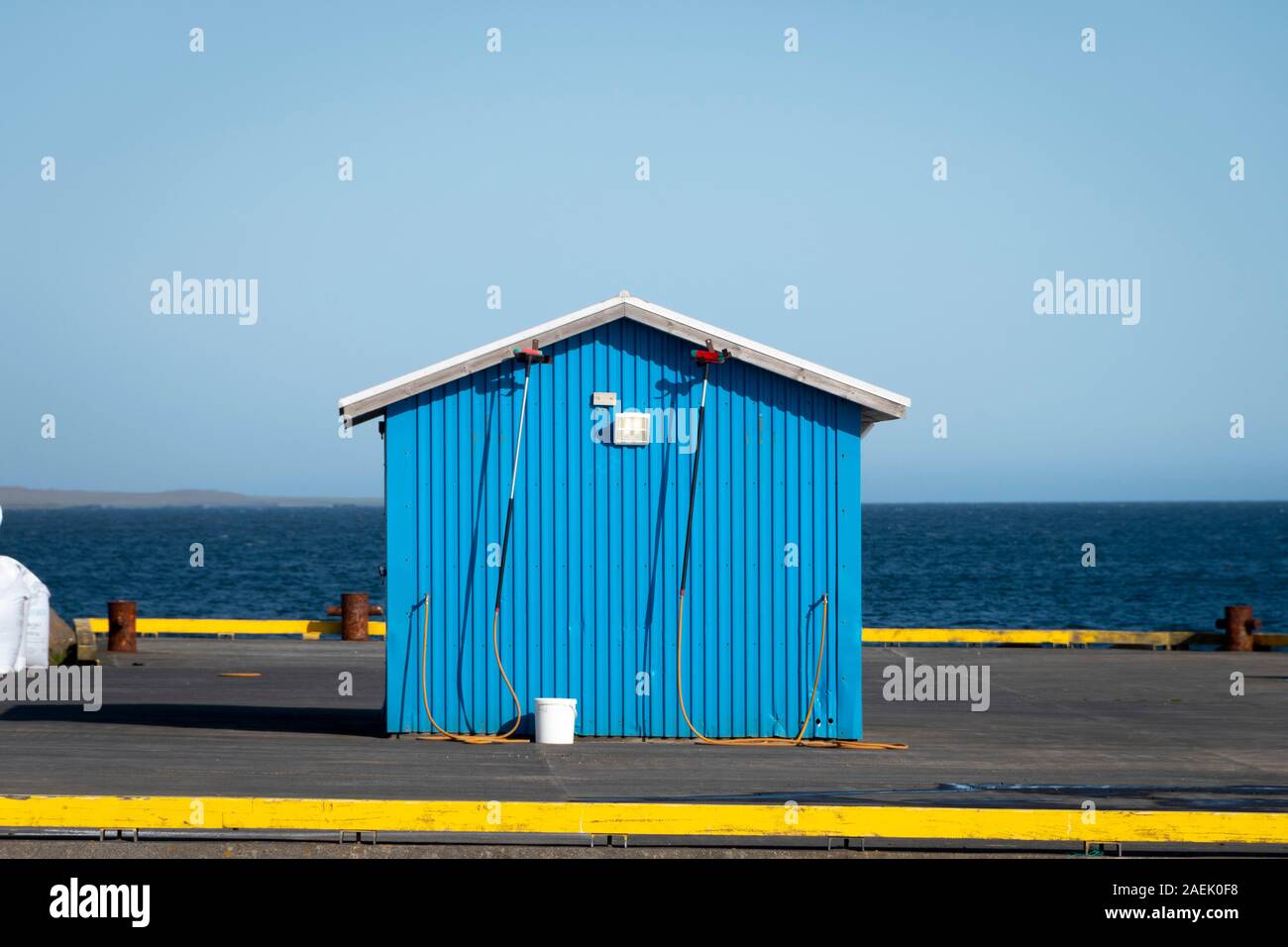 Blue corrugated iron hut on wharf, Djúpivogur, Iceland Stock Photo - Alamy
