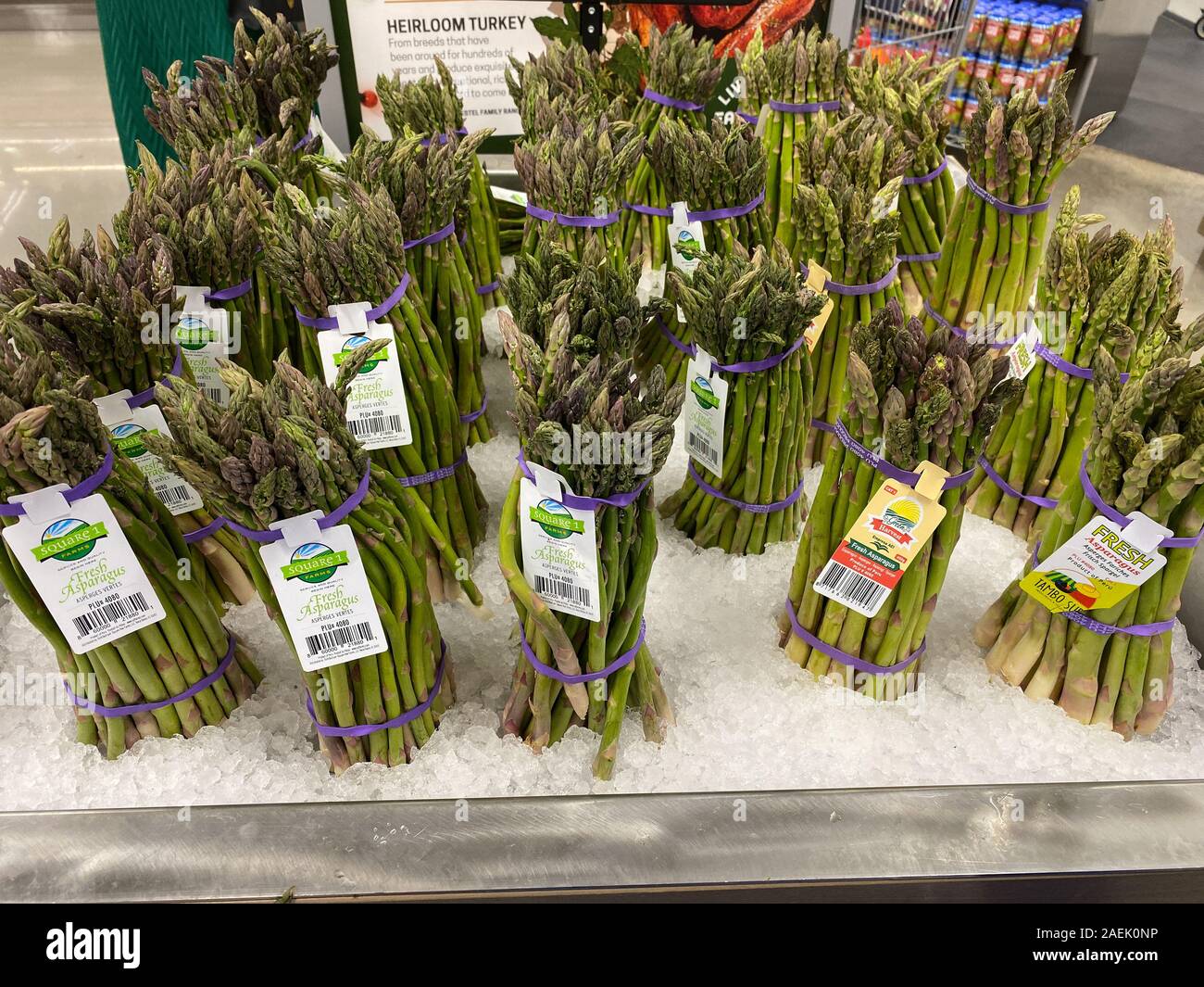 Orlando,FL/USA -11/24/19: A bin of iced fresh asparagus in the produce ...