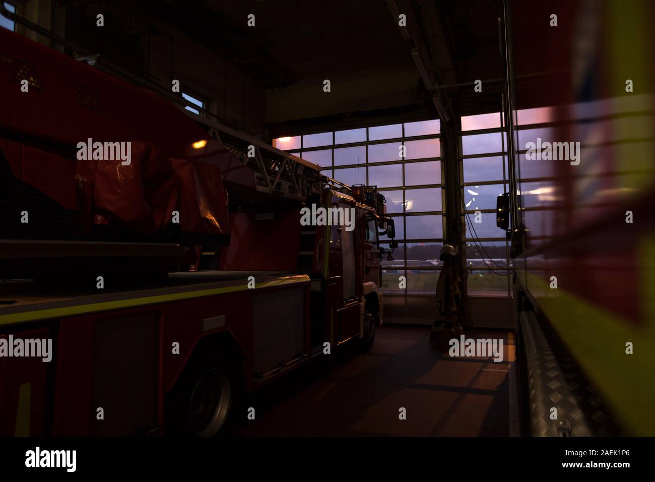 ladder vehicle fire department in the evening Stock Photo - Alamy
