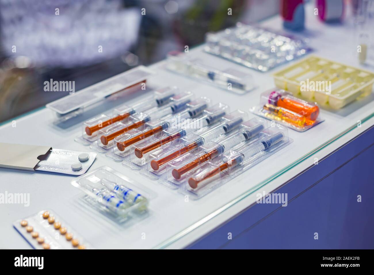Medical capsules, vials, syringes for sale at pharmacy drug store Stock ...