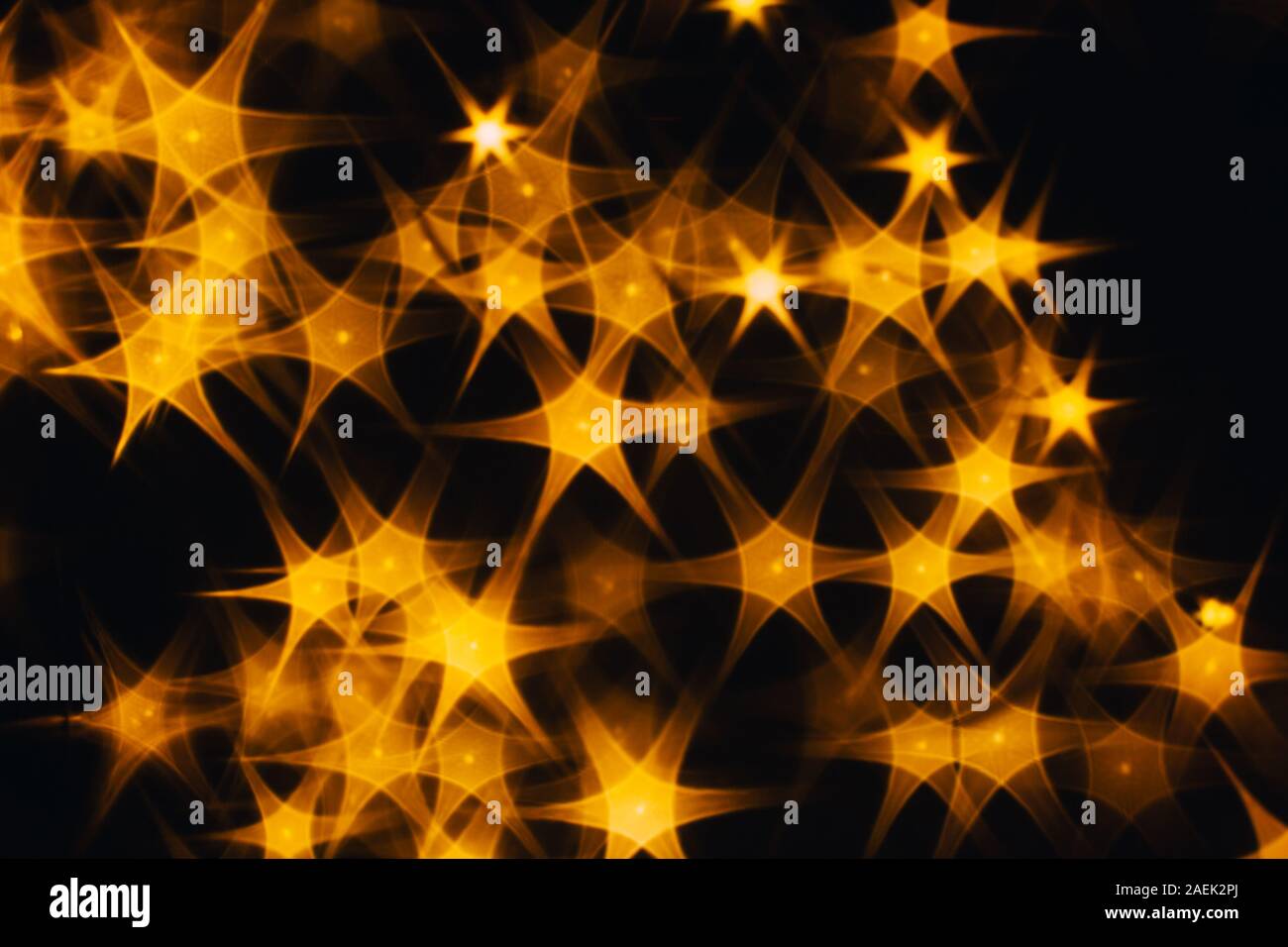Splash of golden stars on black background Stock Photo - Alamy