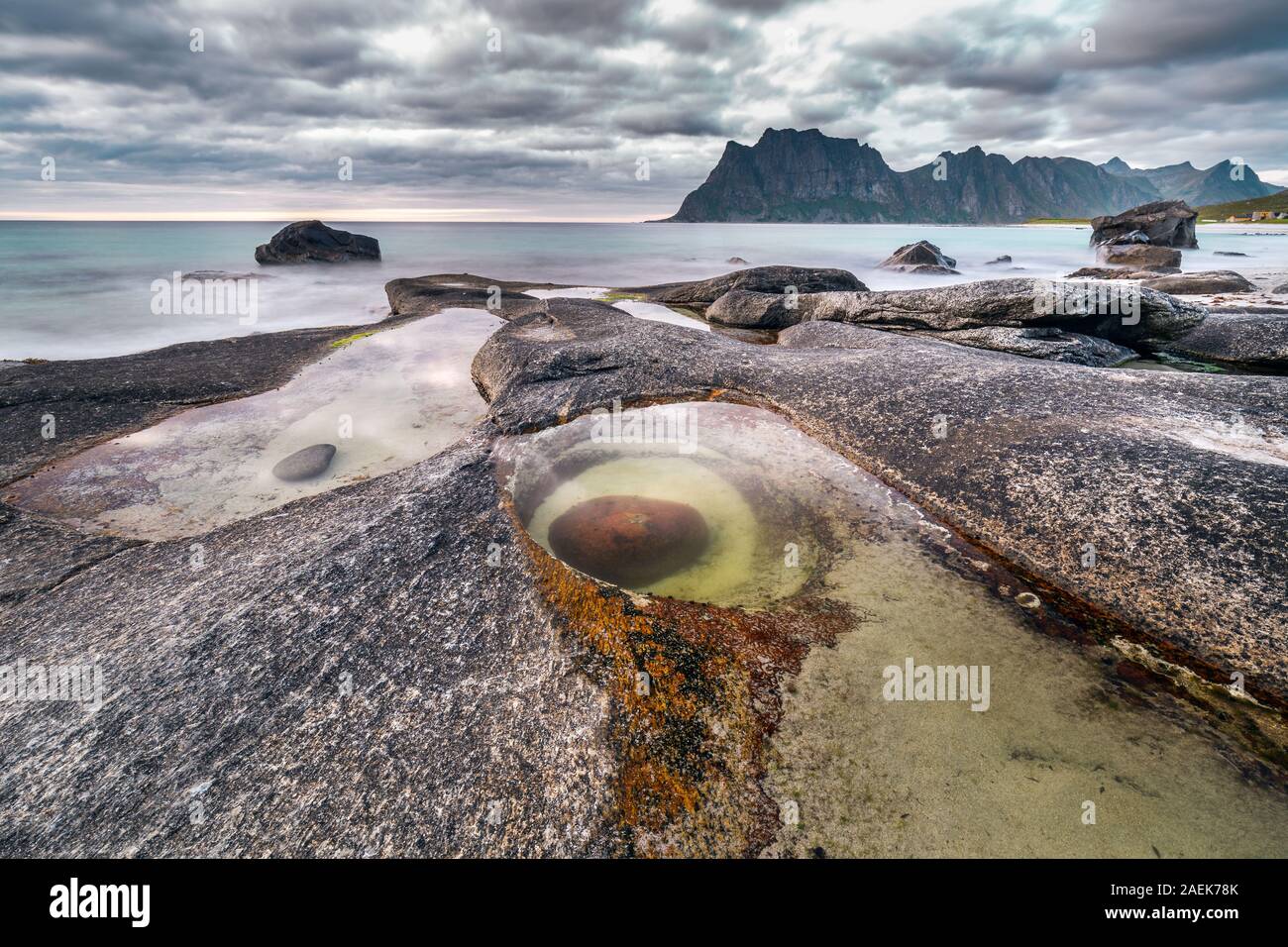 The dragon eye shaped rock at Uttakleiv Beach, Lofoten, the Norwegian ...