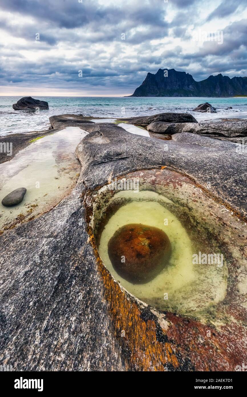 The dragon eye shaped rock at Uttakleiv Beach, Lofoten, the Norwegian ...