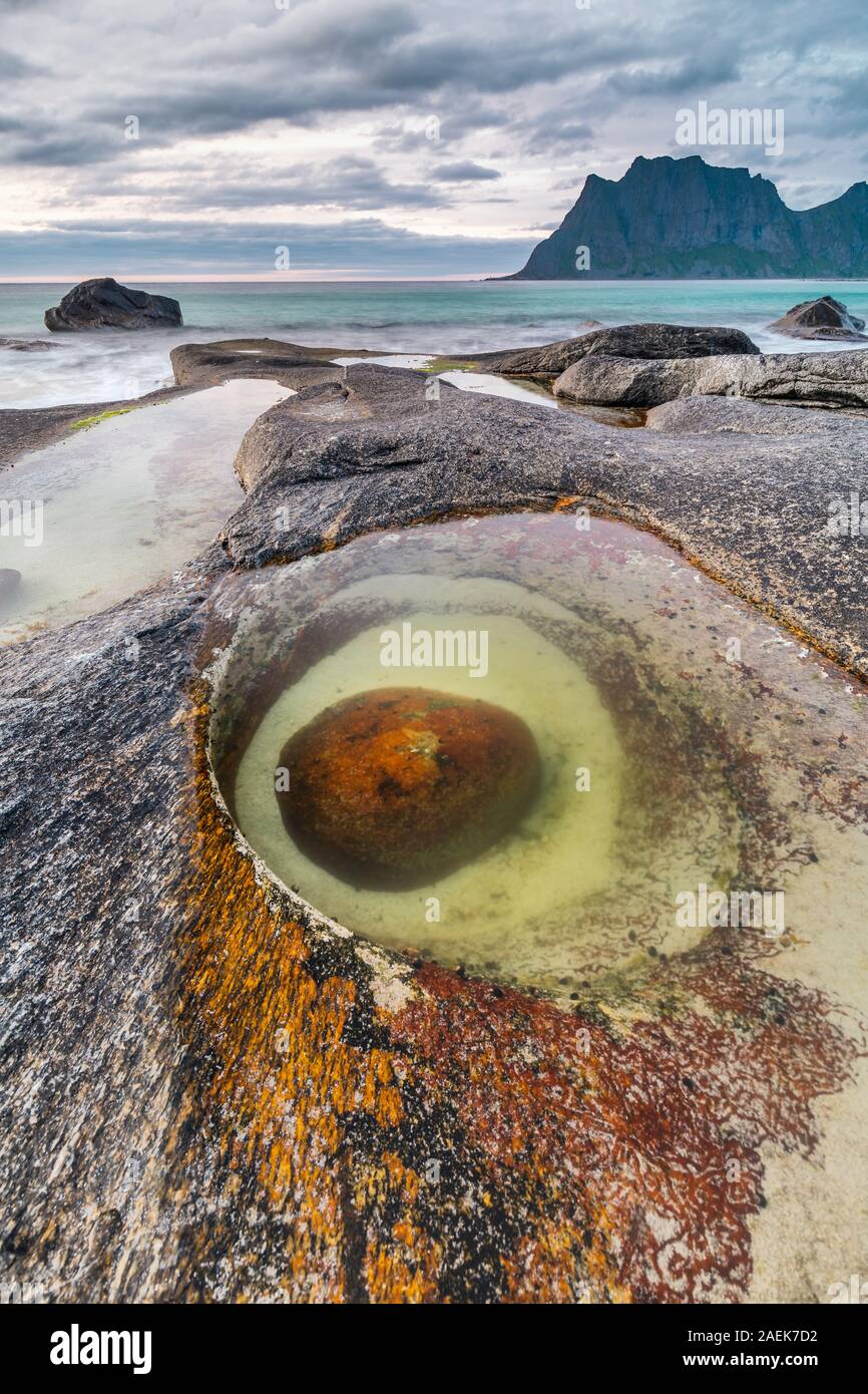 The dragon eye shaped rock at Uttakleiv Beach, Lofoten, the Norwegian ...