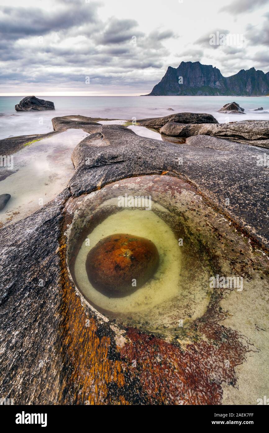 The dragon eye shaped rock at Uttakleiv Beach, Lofoten, the Norwegian ...