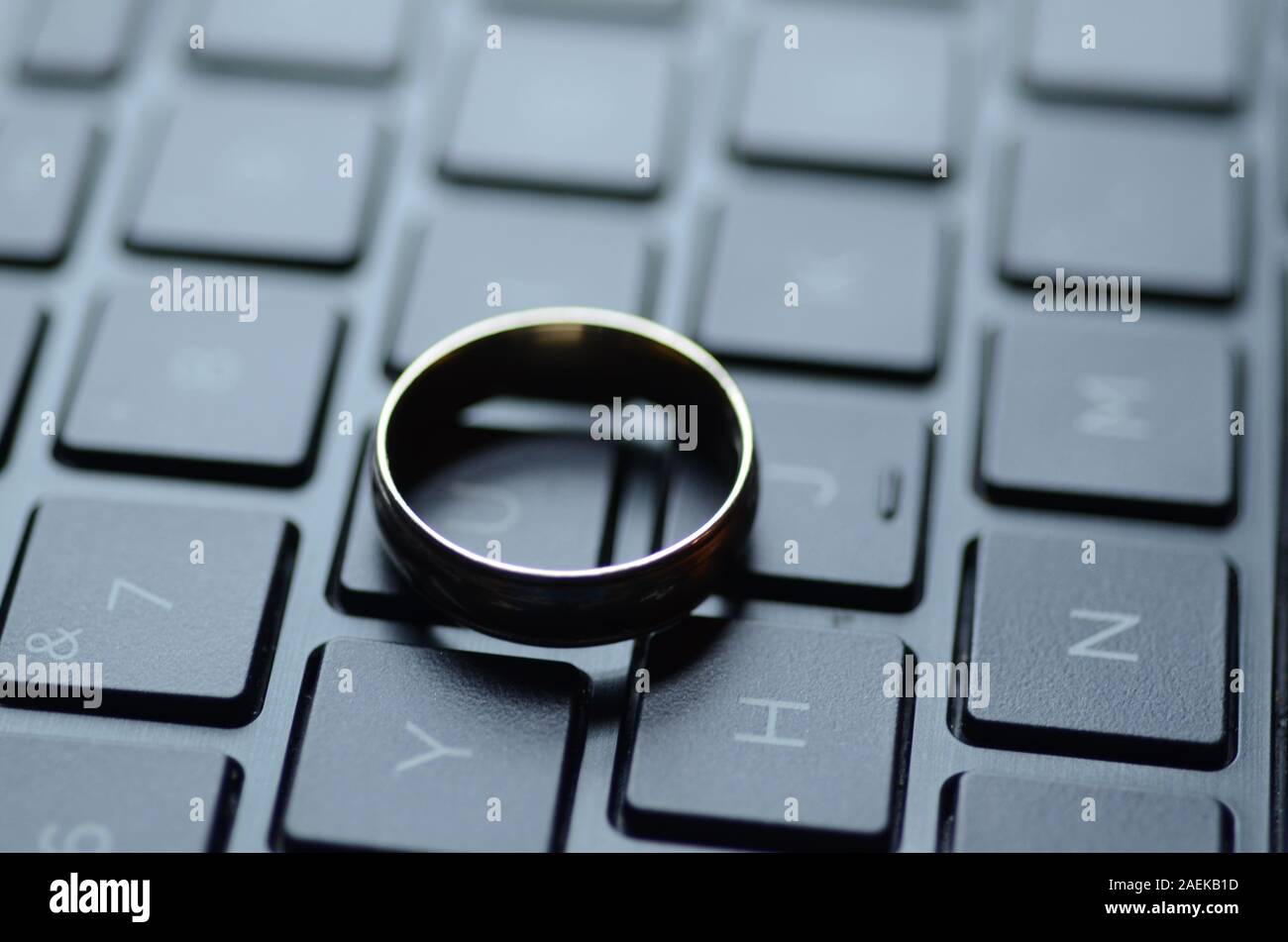 STARGATE: A gold ring appears on the keyboard of a laptop computer ...