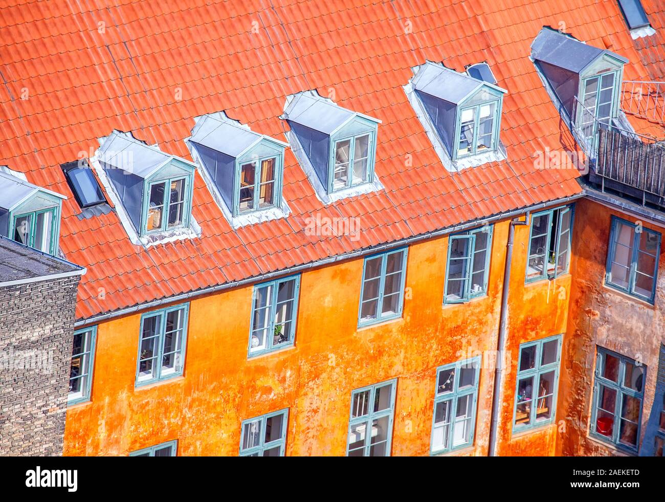 Typical house in Denmark with red roof and attic Stock Photo - Alamy