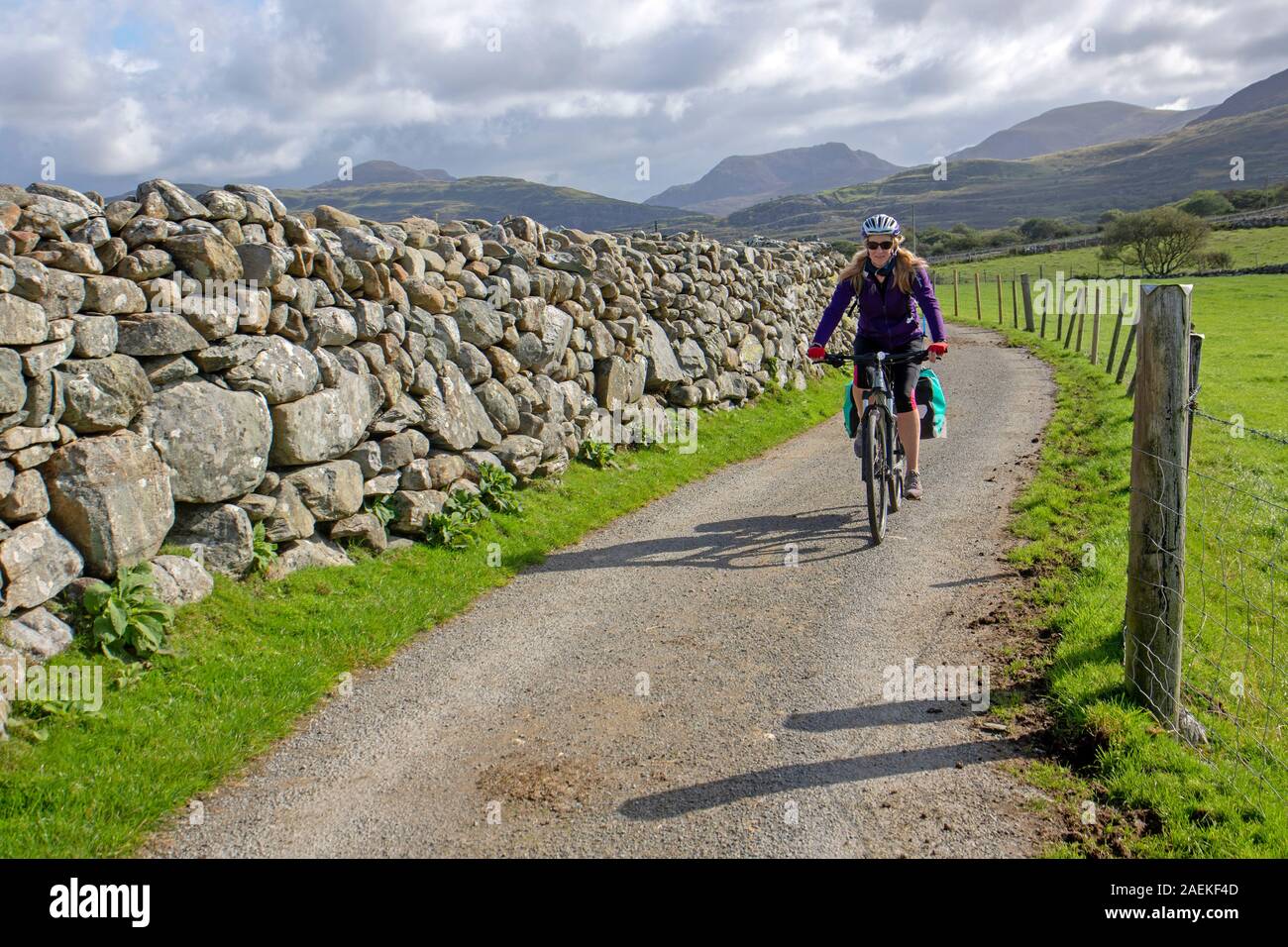 Cycling through farmland at the base of the Snowdonia mountains, part ...