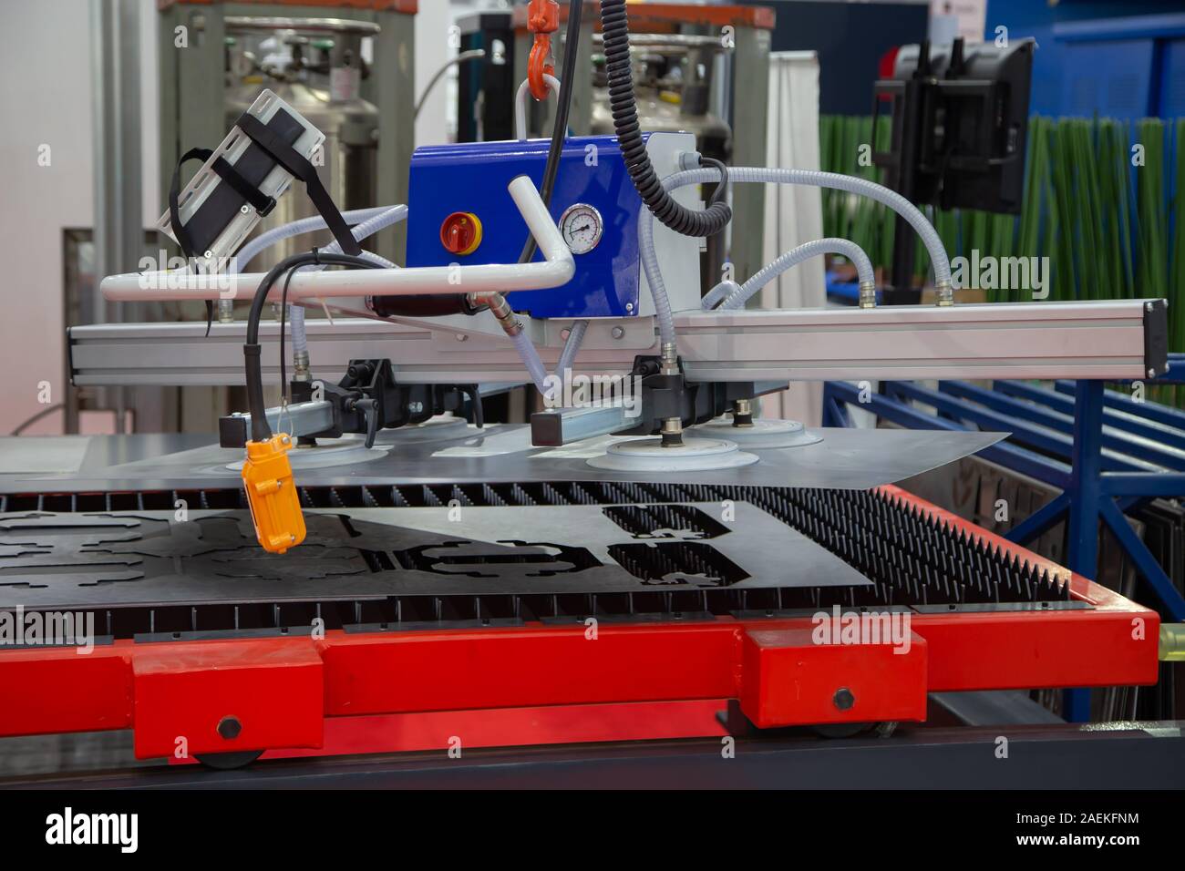 Mechanical vacuum metal sheet lifter loading to production line Stock ...