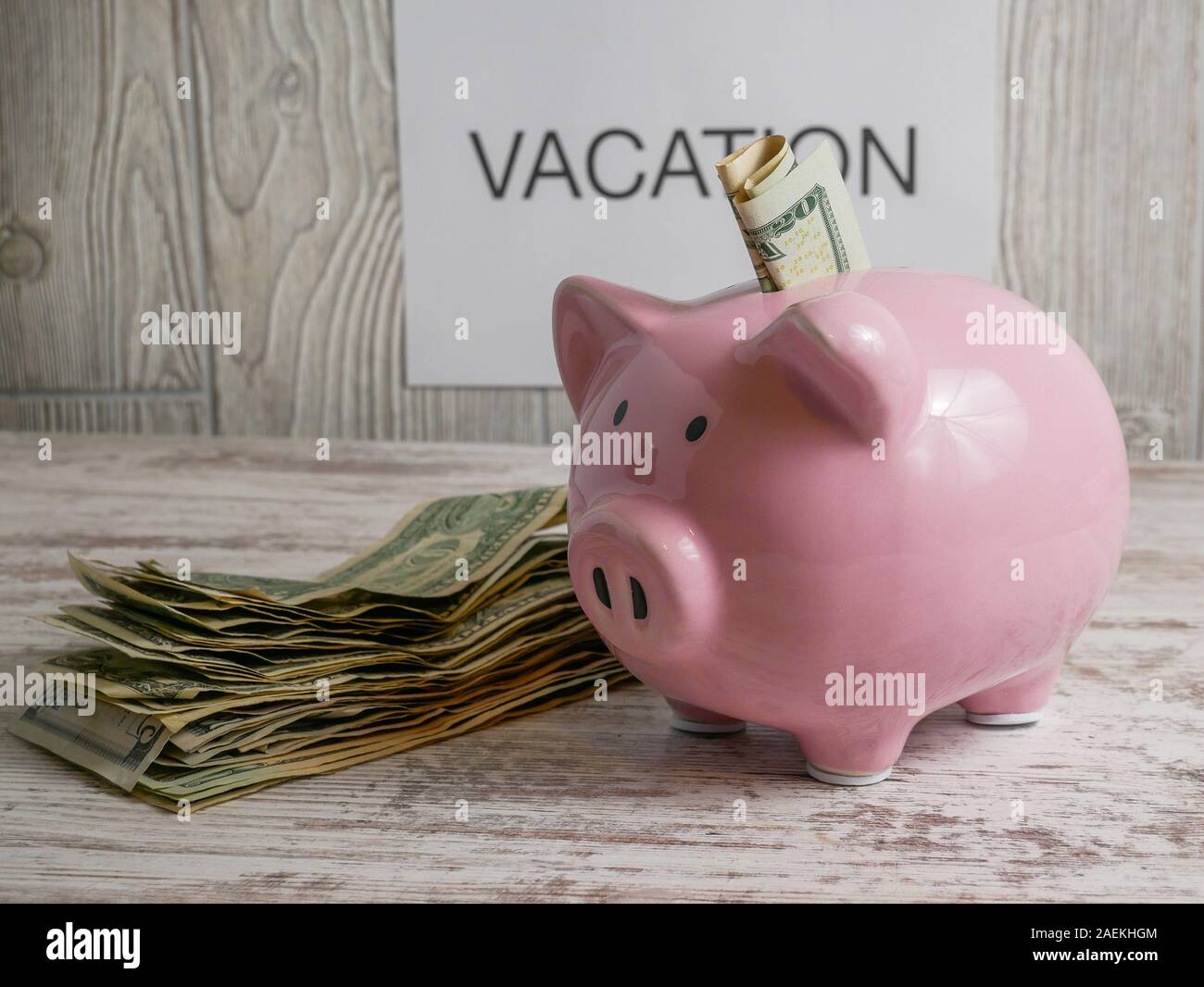 Holding dollar bill and coins hi-res stock photography and images - Alamy