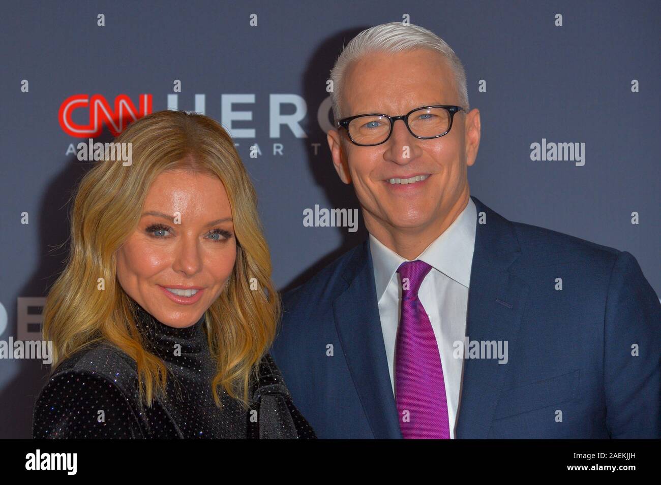 NEW YORK, NY - DECEMBER 08: Kelly Ripa and Anderson Cooper attend the ...
