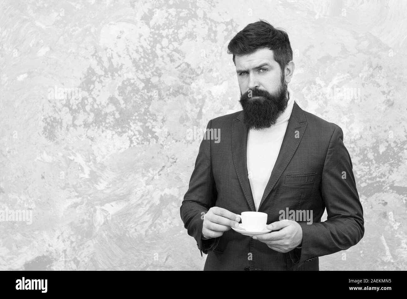 Specialty coffee. Man handsome bearded businessman hold cup of coffee ...