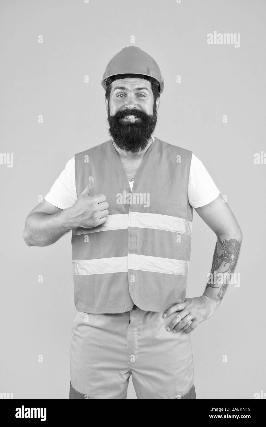 Good job. Safety apparel for construction industry. Bearded brutal ...