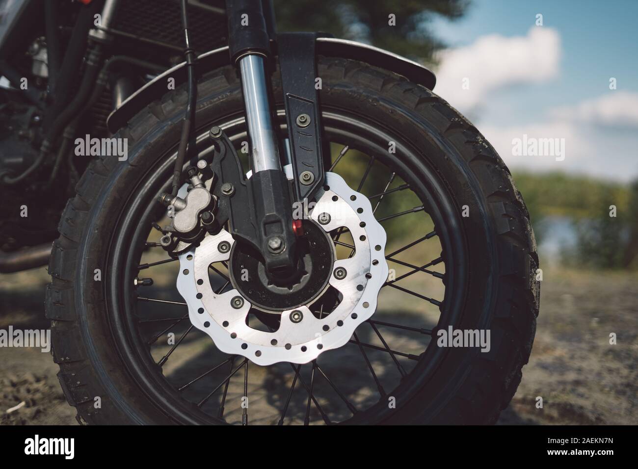 Old style spoked motorcycle wheel with disk brakes Stock Photo - Alamy