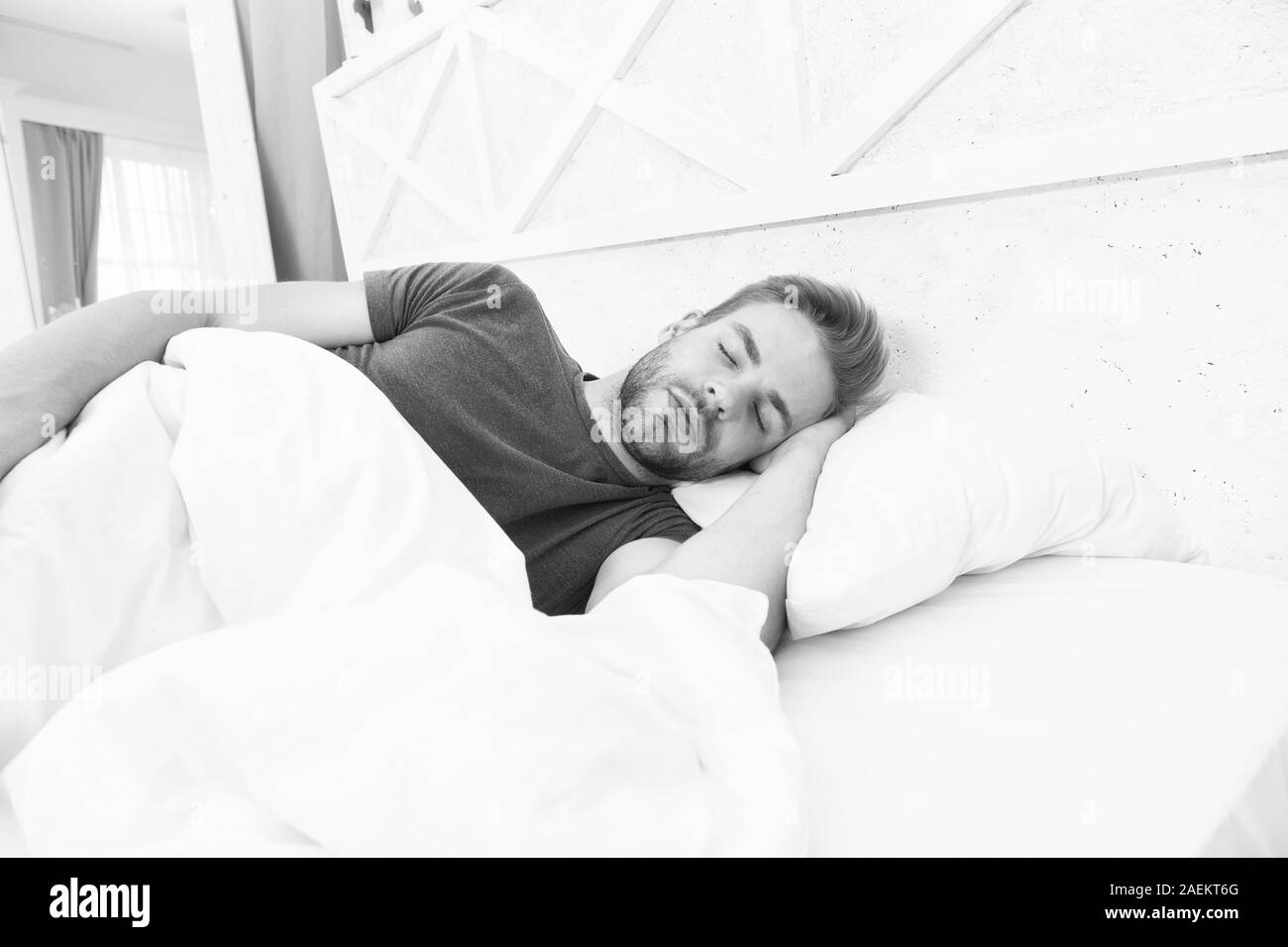 Tips sleeping better. Bearded man sleeping face relaxing. Maintaining ...